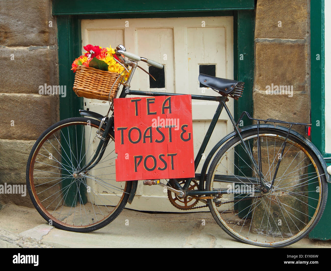 Bicycle sign advertising Tea, Toast and Post outside a cafe at Robin ...