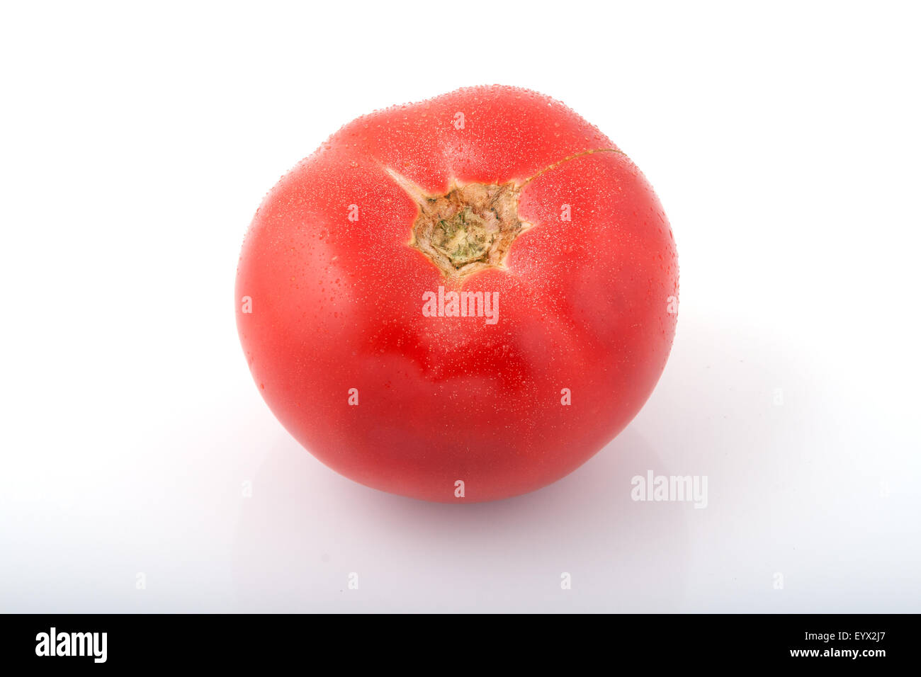 One ripe tomato, isolated Stock Photo - Alamy
