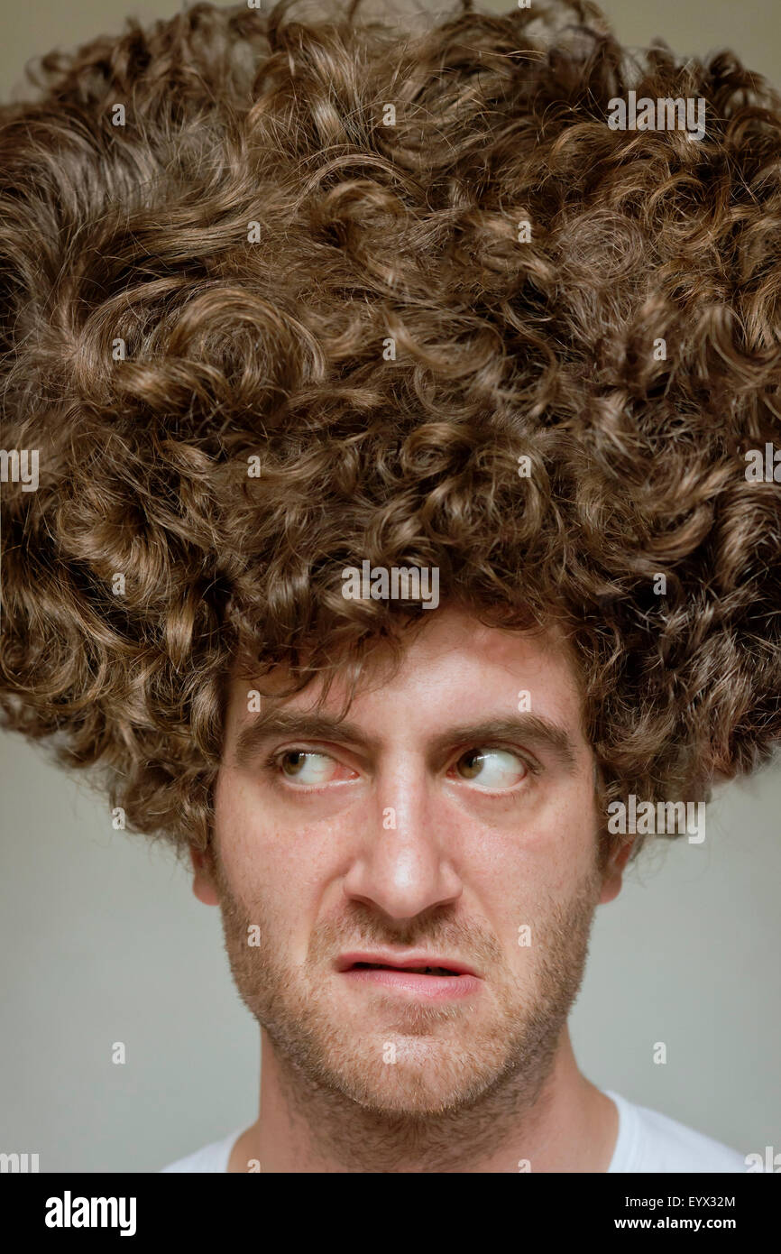 Scruffy faced man with messy curly hair afro Stock Photo - Alamy Scruffy faced man with messy curly hair afro Stock Photo - Alamy