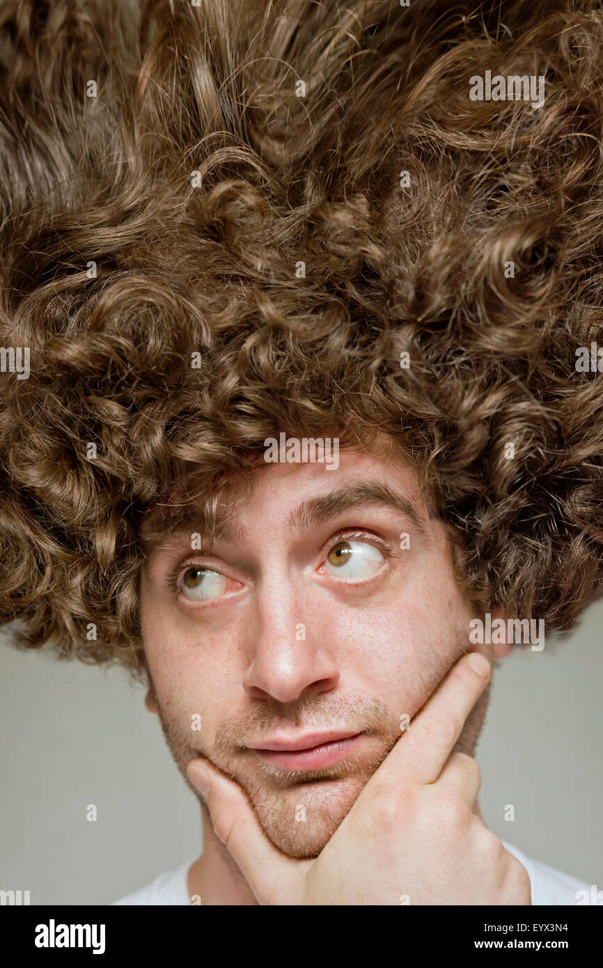 Scruffy faced man with messy curly hair afro Stock Photo - Alamy Scruffy faced man with messy curly hair afro Stock Photo - Alamy