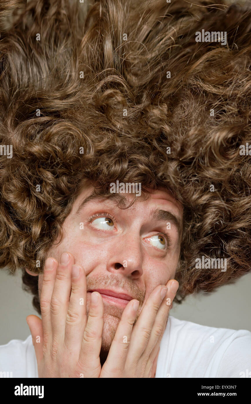 Scruffy faced man with messy curly hair afro Stock Photo - Alamy Scruffy faced man with messy curly hair afro Stock Photo - Alamy