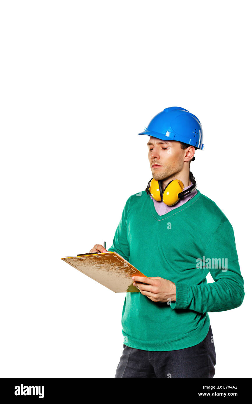 Construction worker holding a checklist and a pen. Architect taking ...