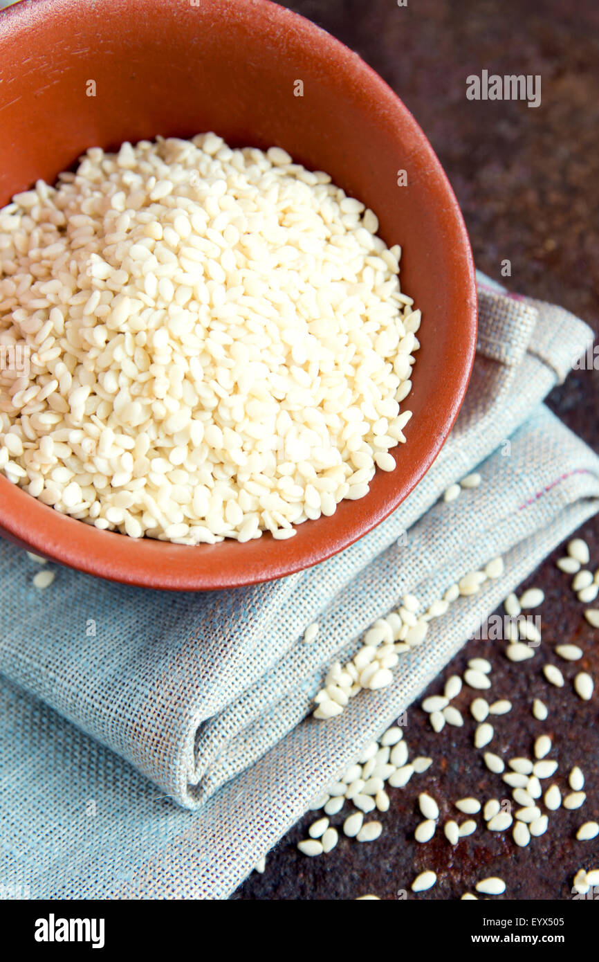 Sesame seeds in bowl close up Stock Photo - Alamy