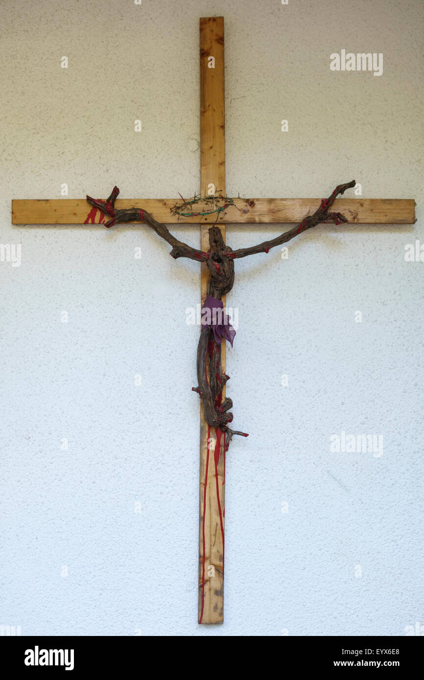 Croatia. A church crucifix with figure of Christ made from a twisted ...