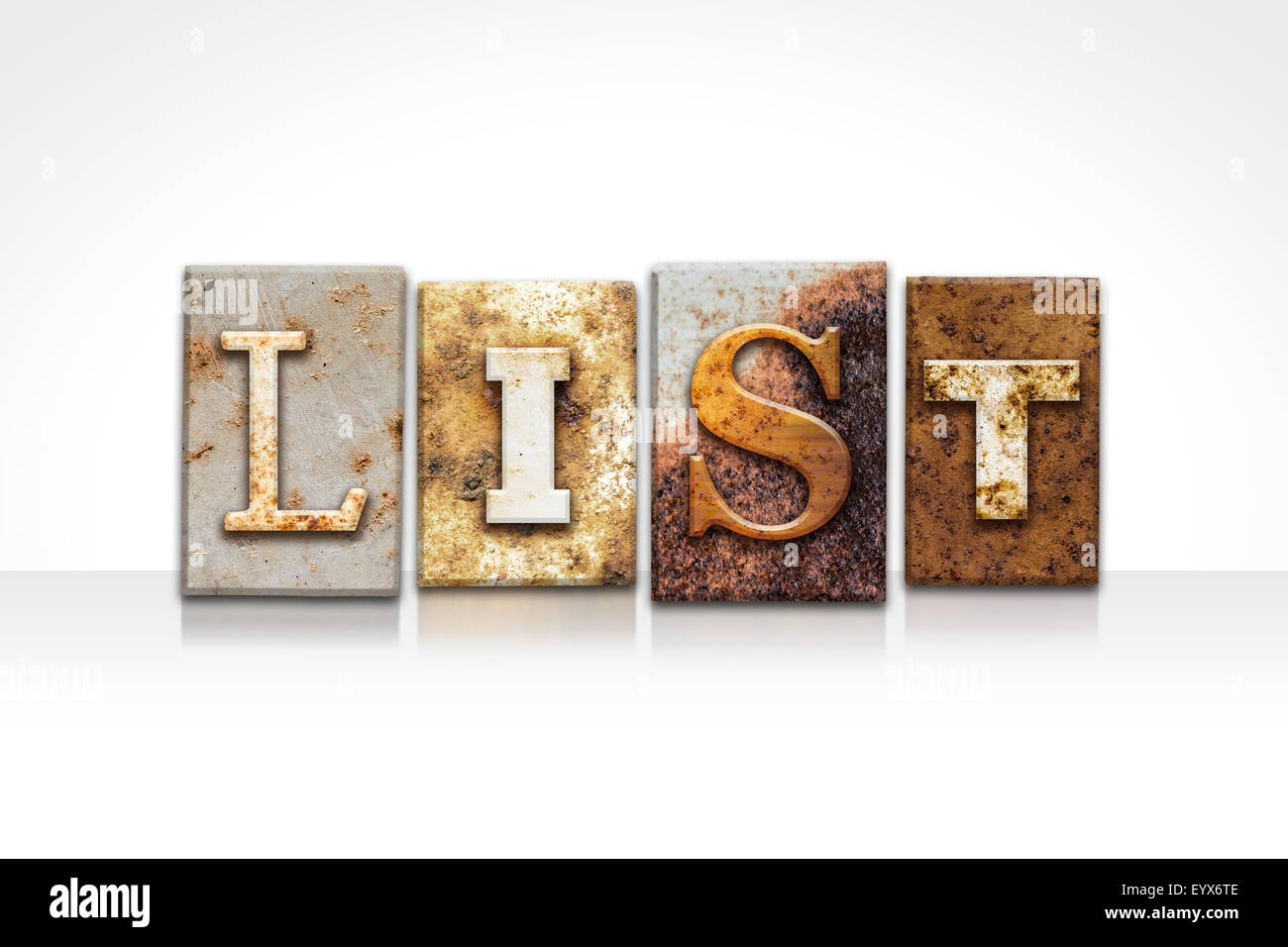The word "LIST" written in rusty metal letterpress type isolated on a ...