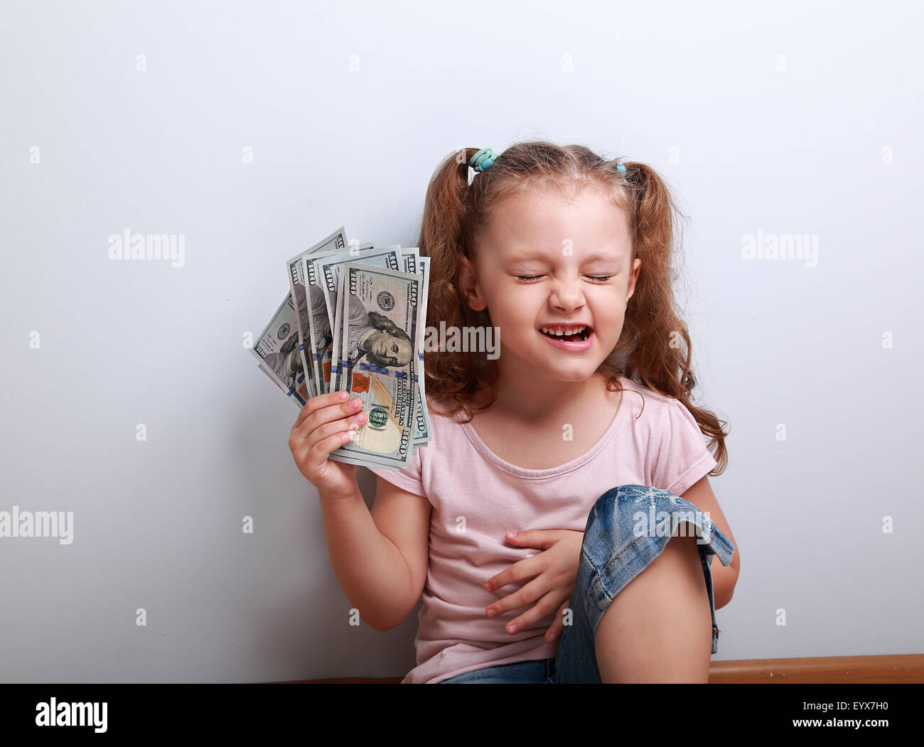 Child holding one dollar bill hi-res stock photography and images - Alamy