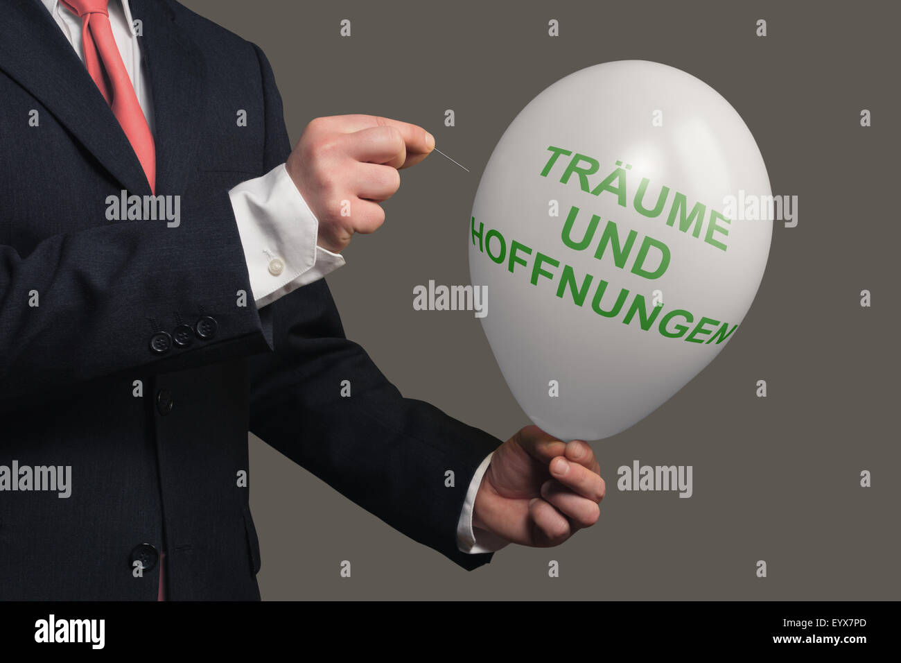 A Dream bursts with a Balloon and the German Words for "Dreams and Hope ...