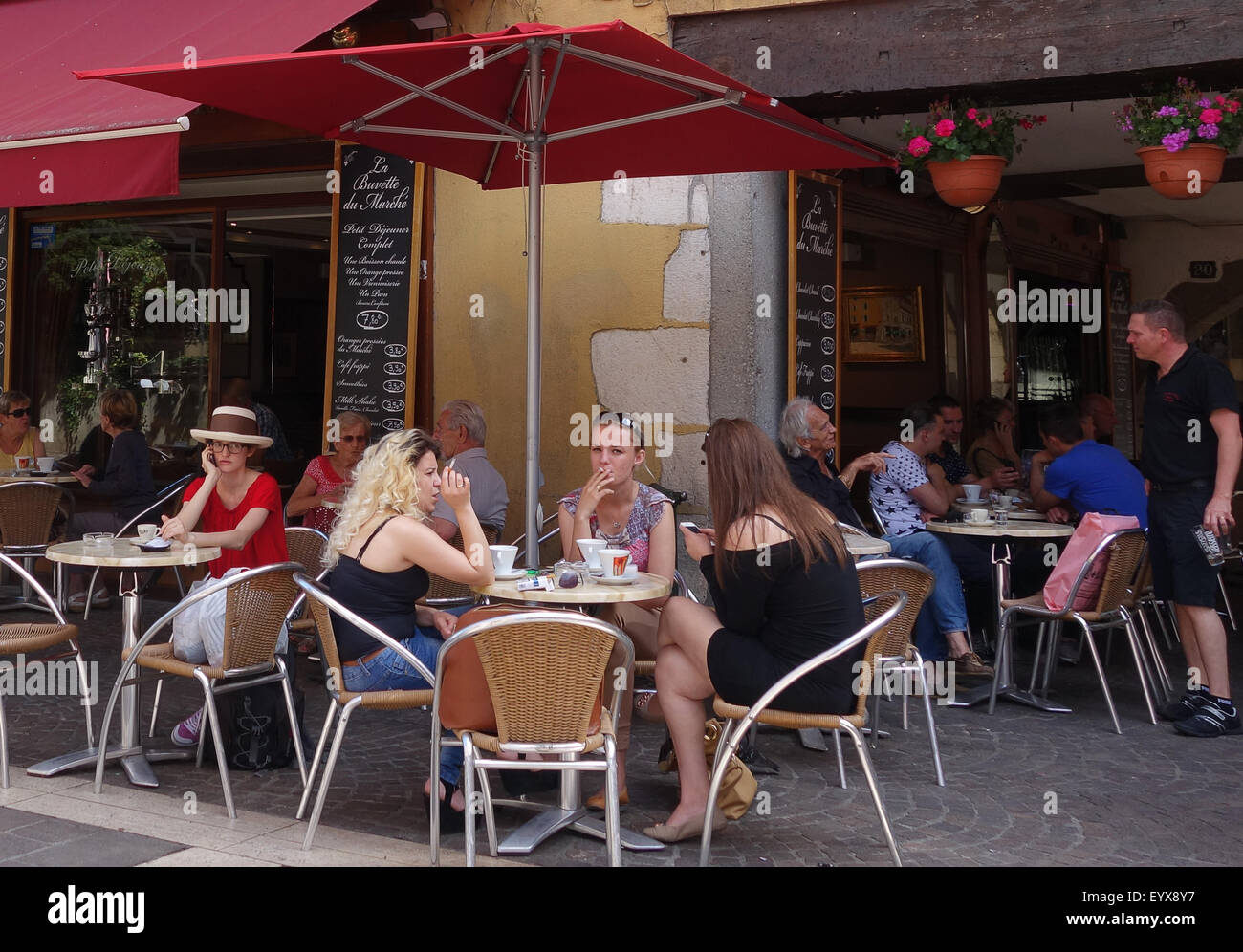 French cafe bar in Annecy France outside tables customers smoking Stock ...
