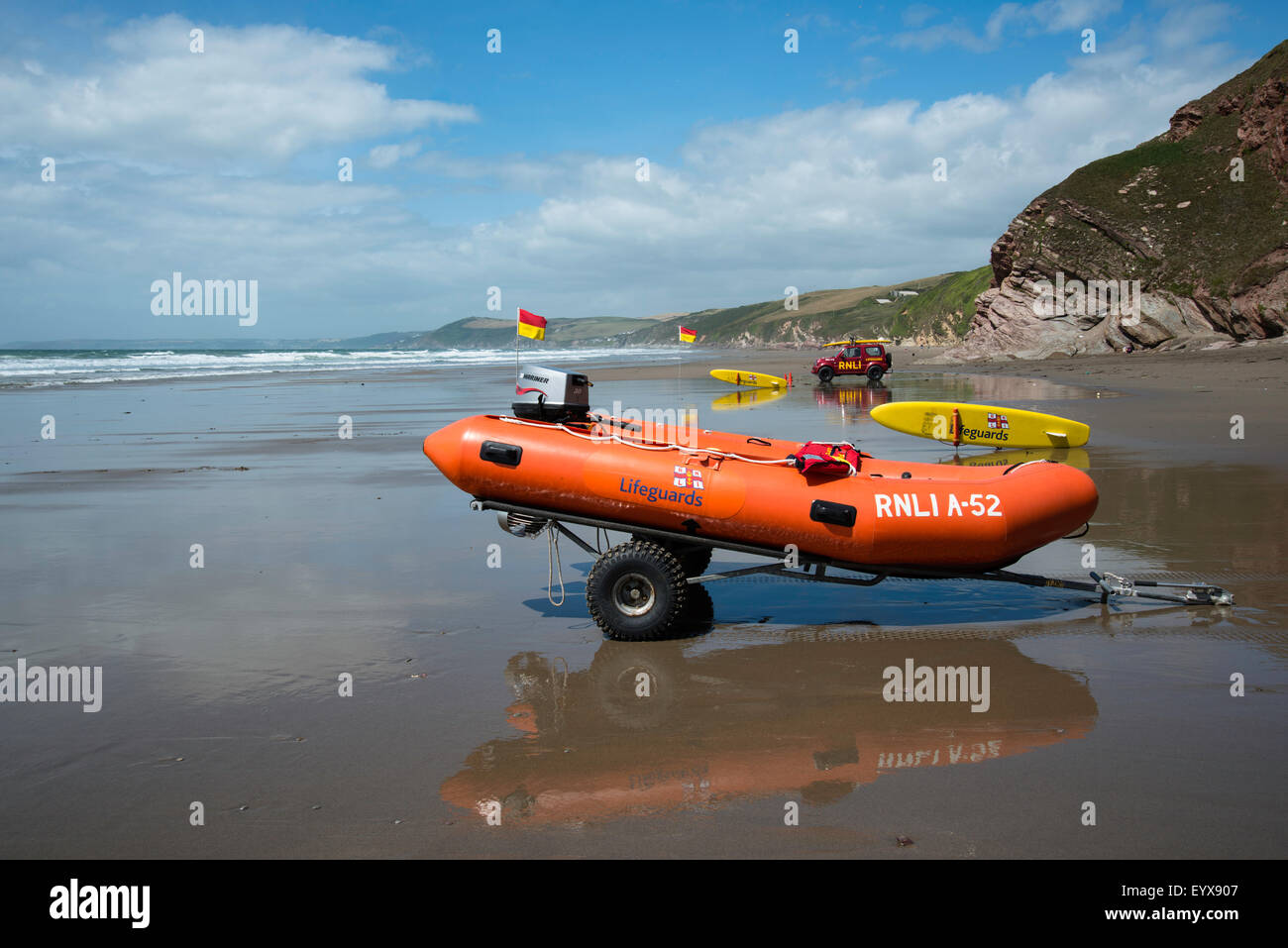 Surf lifesaving, warning flags and equipment on beach ready for use by ...