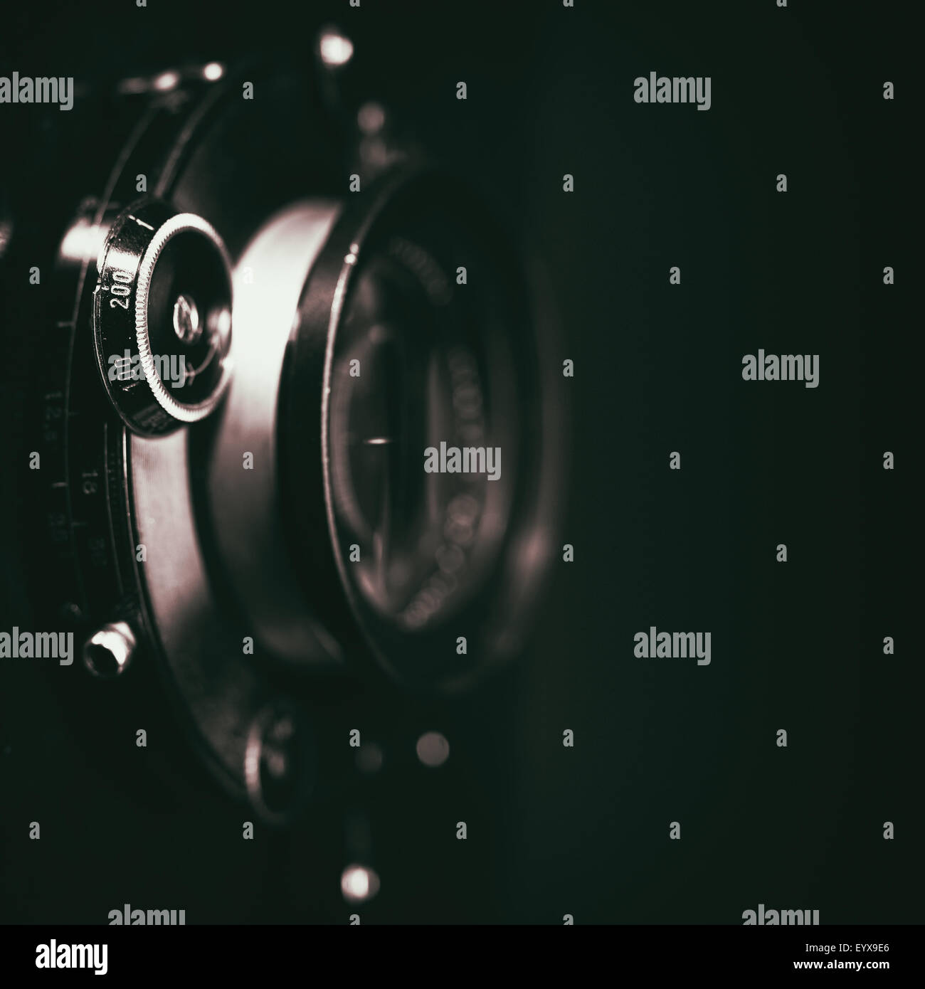 Retro view camera lens with vintage shutter, abstract techno ...