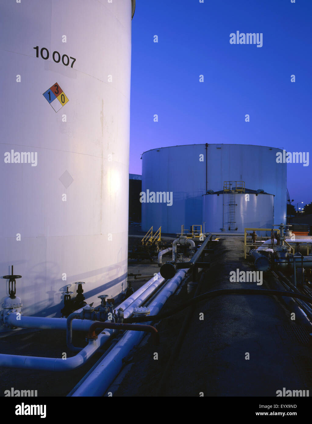 Tank farm at night Stock Photo - Alamy