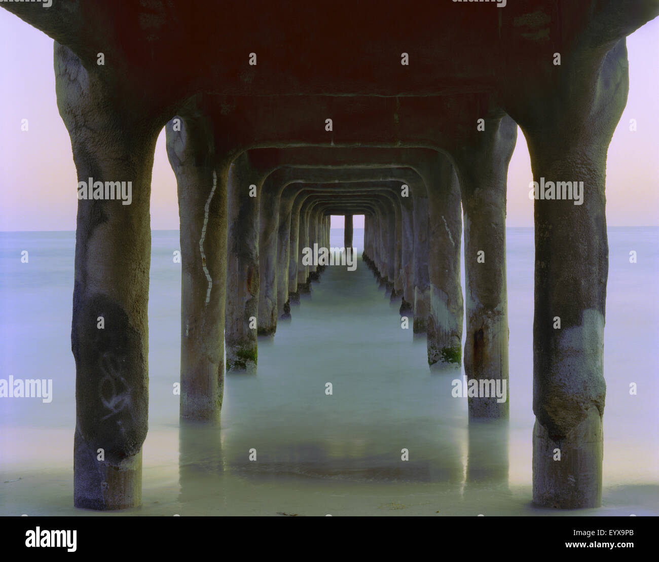 Beneath old pier Stock Photo - Alamy