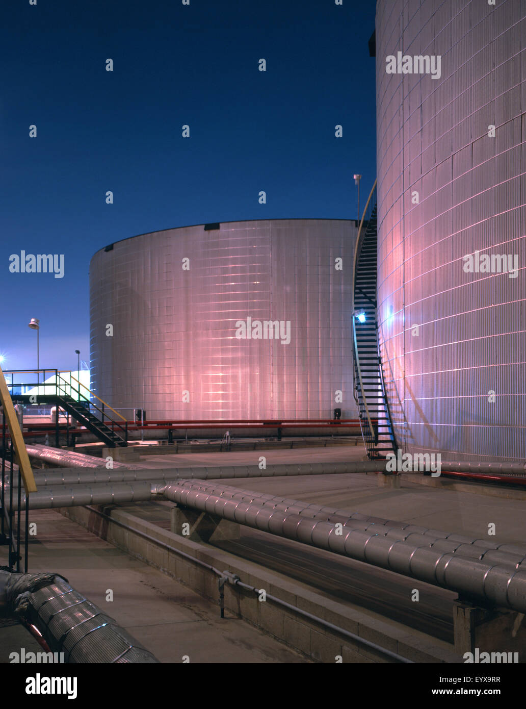 tank farm at night Stock Photo - Alamy