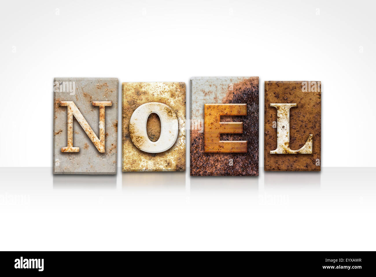 The word "NOEL" written in rusty metal letterpress type isolated on a ...