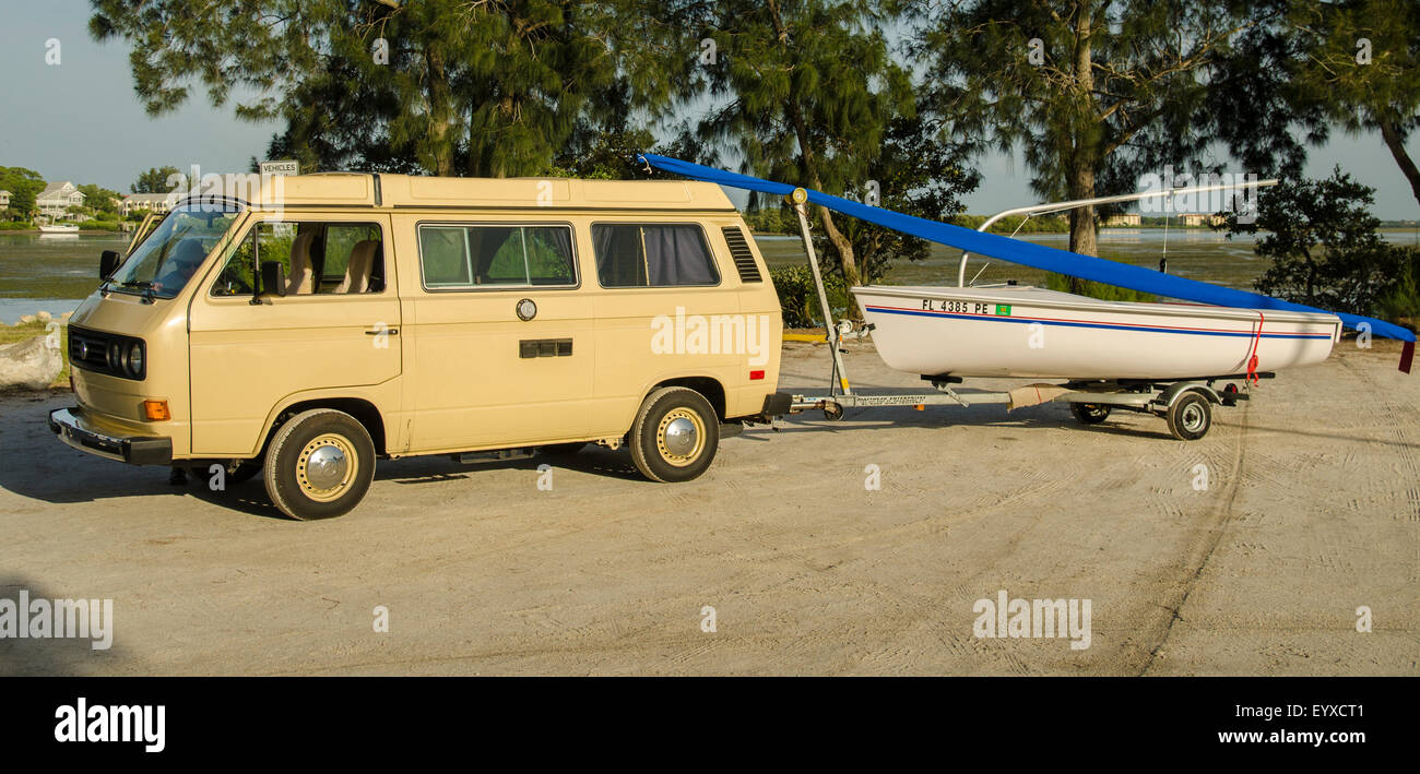 Vanagon towing small sail boat Stock Photo - Alamy