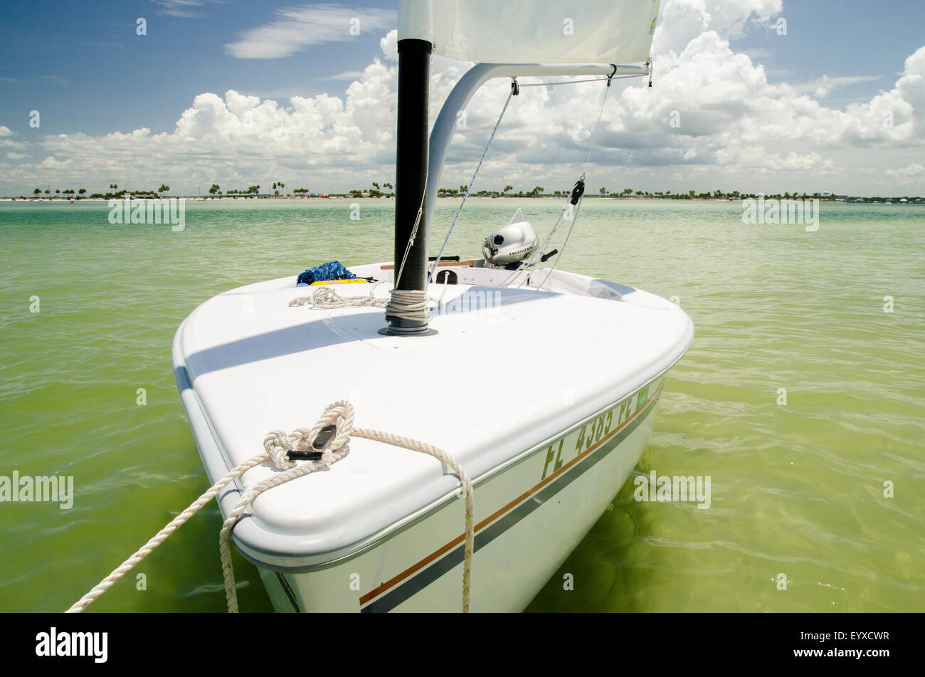 Small white sailboat on St Joseph Sound in Dunedin, Florida Stock Photo ...