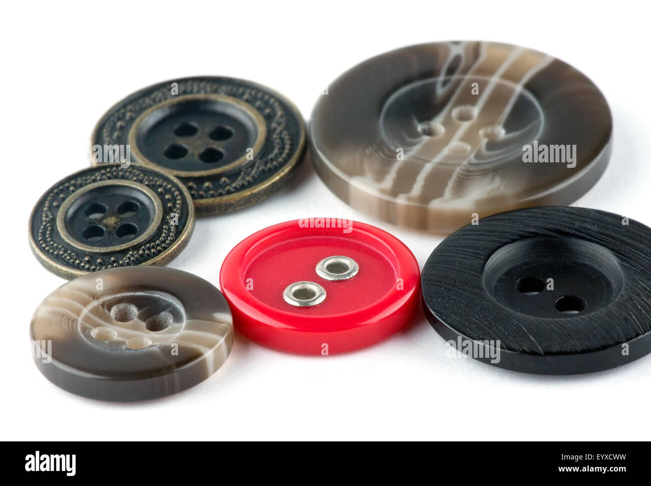Various sewing buttons on white background Stock Photo - Alamy