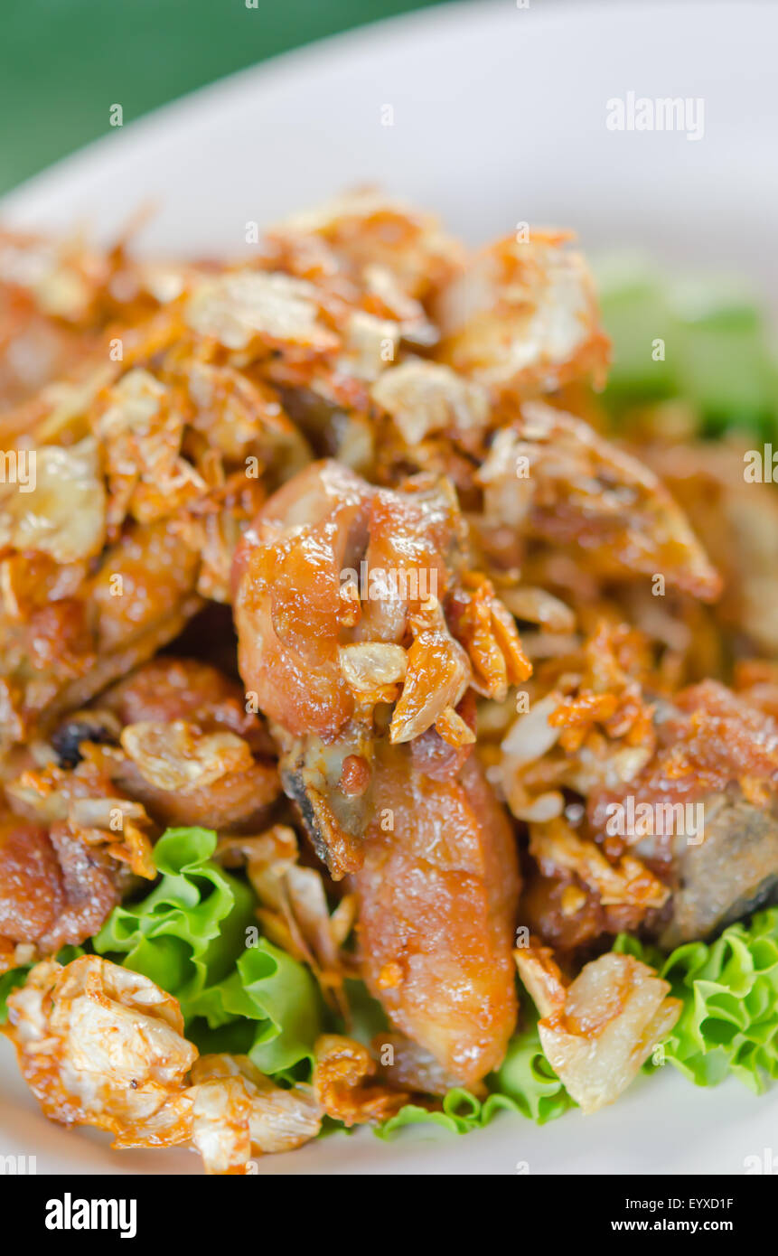 deep fried chicken with fried garlic and fresh vegetable Stock Photo ...
