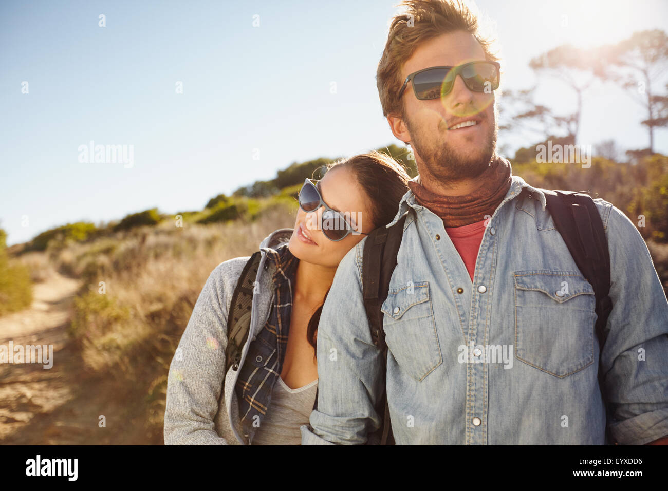 Portrait of young couple in love on hike. Young beautiful couple hikers ...