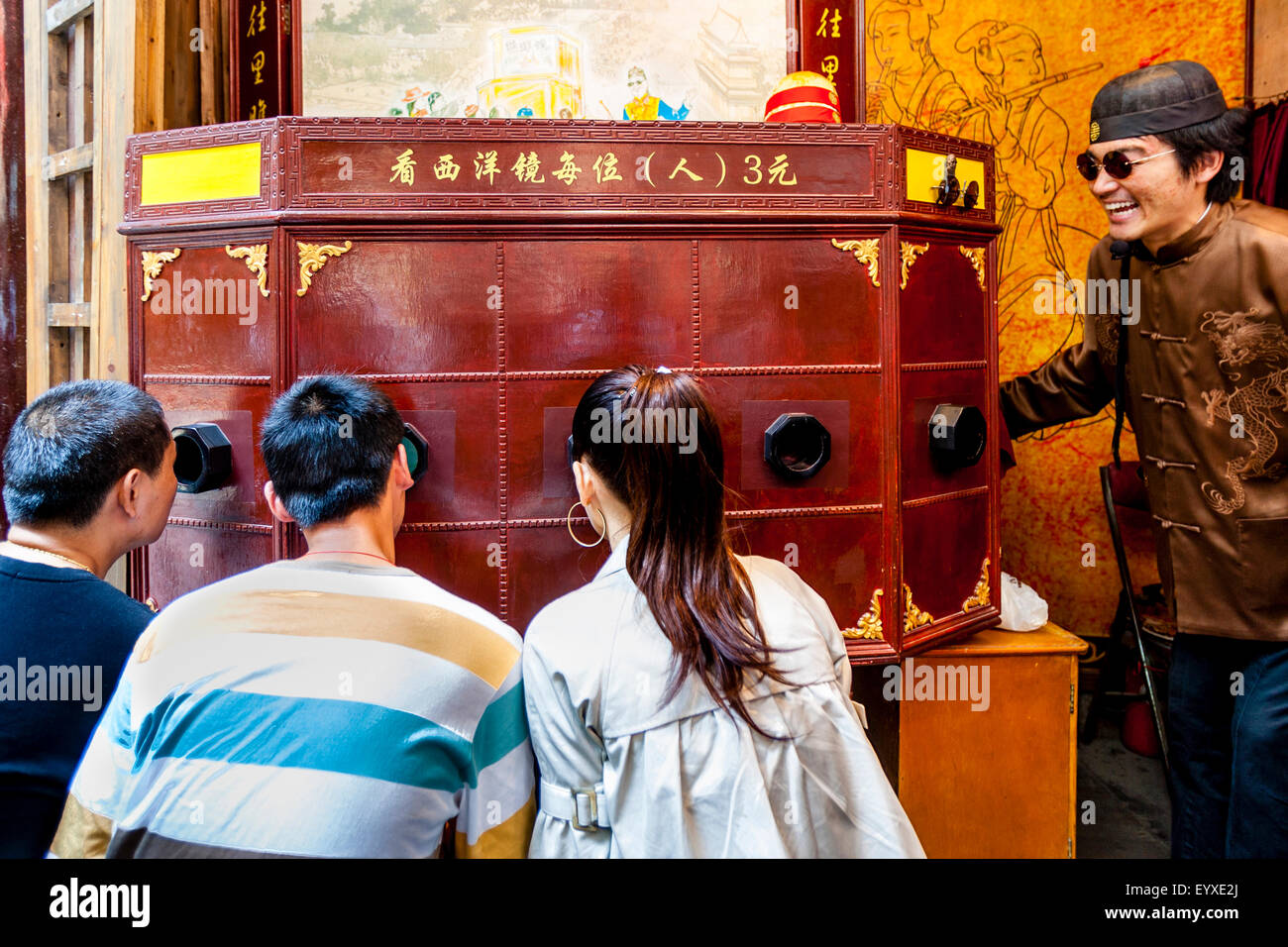 People Watch A Traditional Chinese Peep Show, Old Shanghai, Shanghai ...