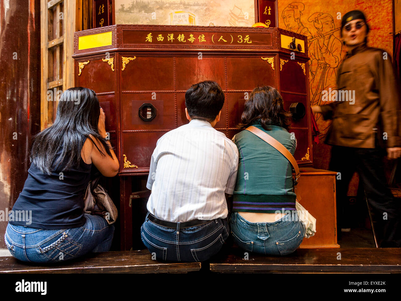 People Watch A Traditional Chinese Peep Show, Old Shanghai, Shanghai ...