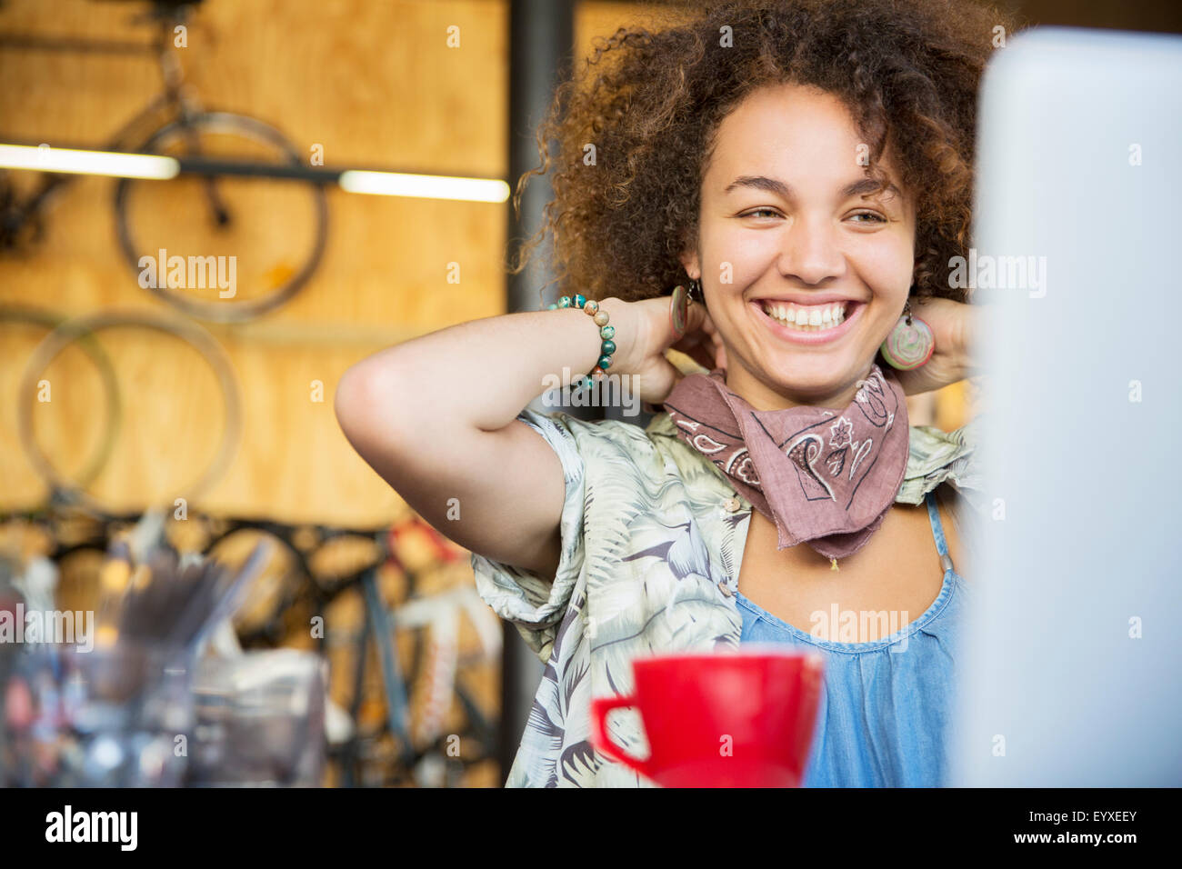 Woman working behind laptop in hi-res stock photography and images - Alamy