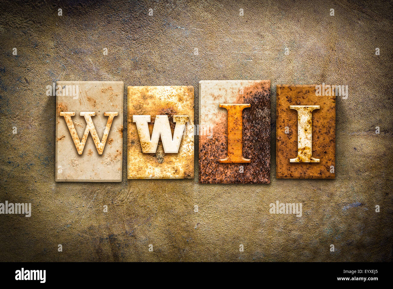 The word "WWII" written in rusty metal letterpress type on an old aged ...