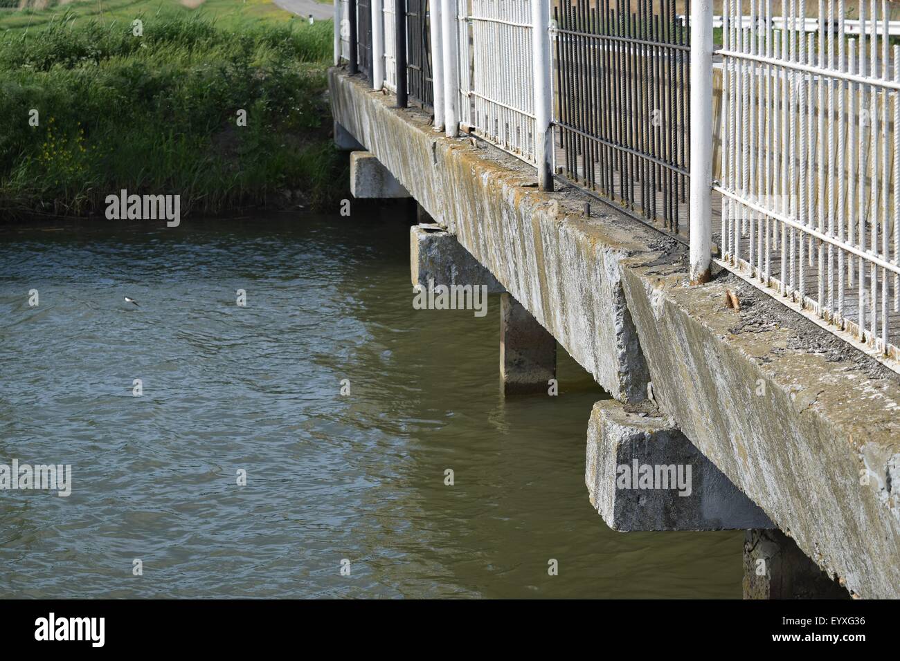 The bridge via the channel. System of rice checks Stock Photo - Alamy