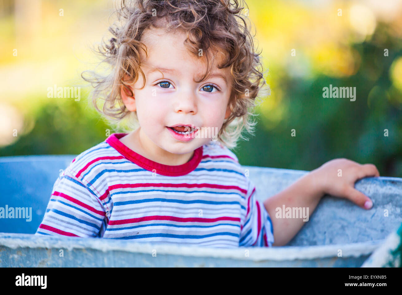 Cute baby boy playing wheel hi-res stock photography and images - Alamy