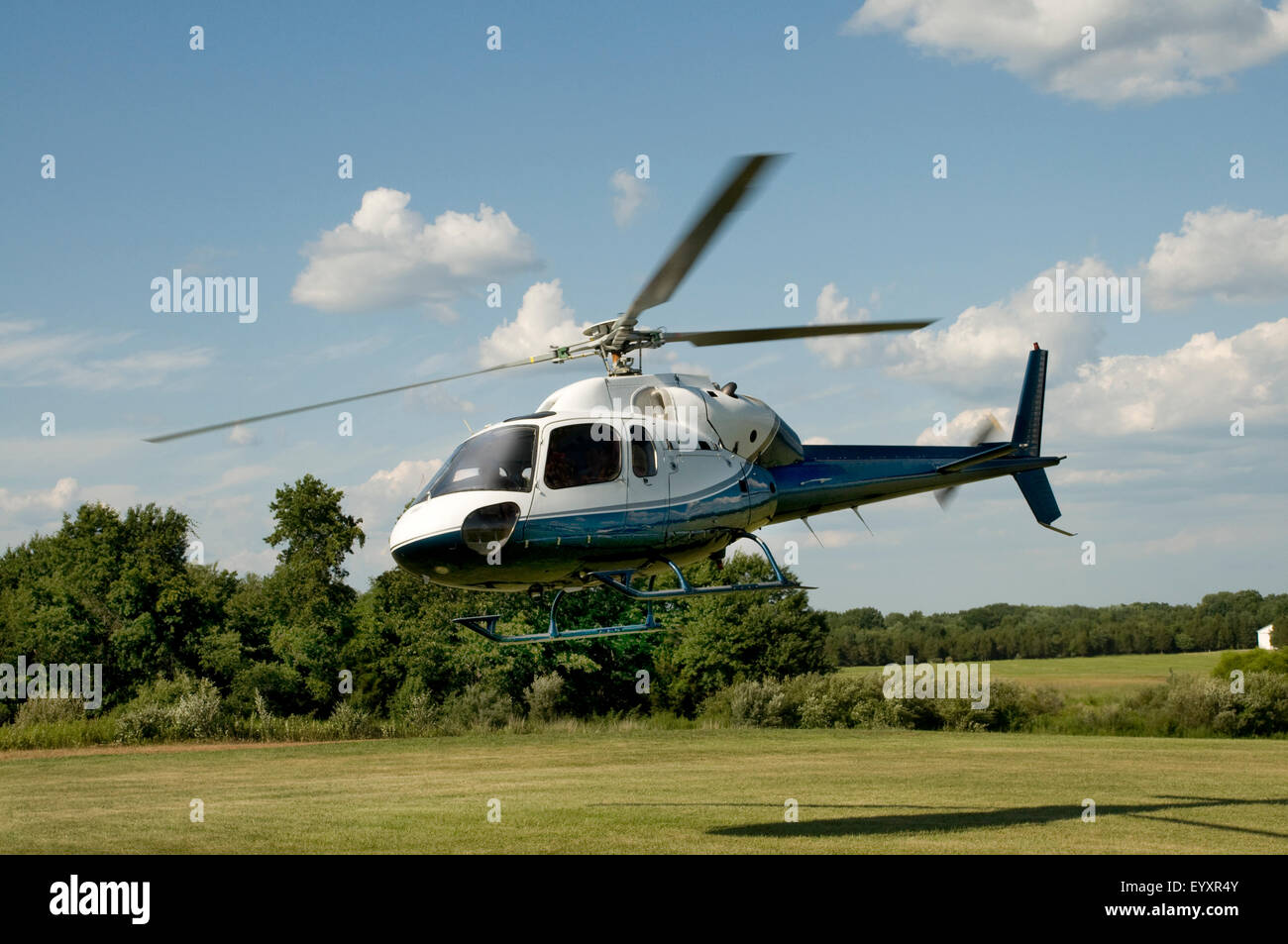 Blue and white helicopter hi-res stock photography and images - Alamy