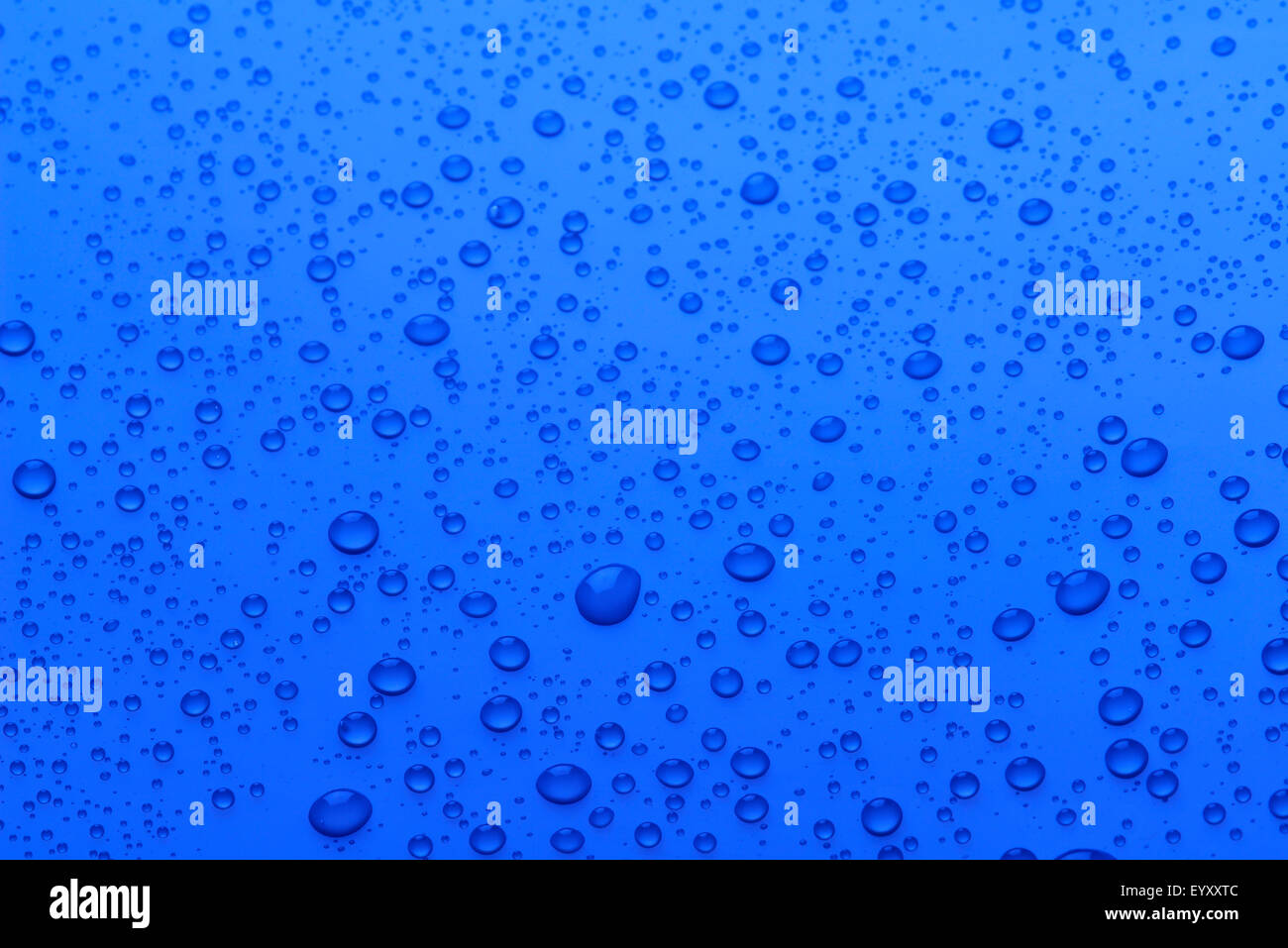 Blue Water Drops Stock Photo - Alamy