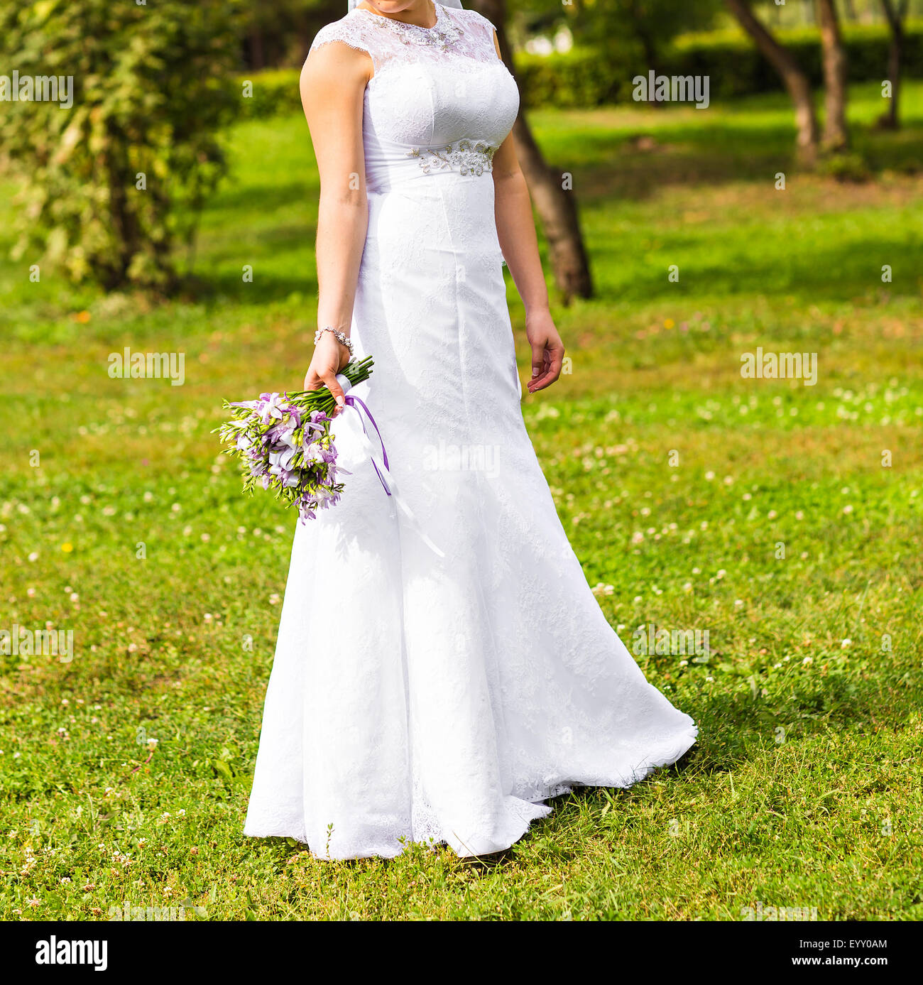 Bride Holding Wedding Bouquet Stock Photo - Alamy