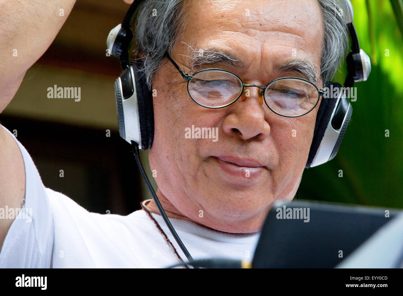 Grandfather enjoying music hi-res stock photography and images - Alamy