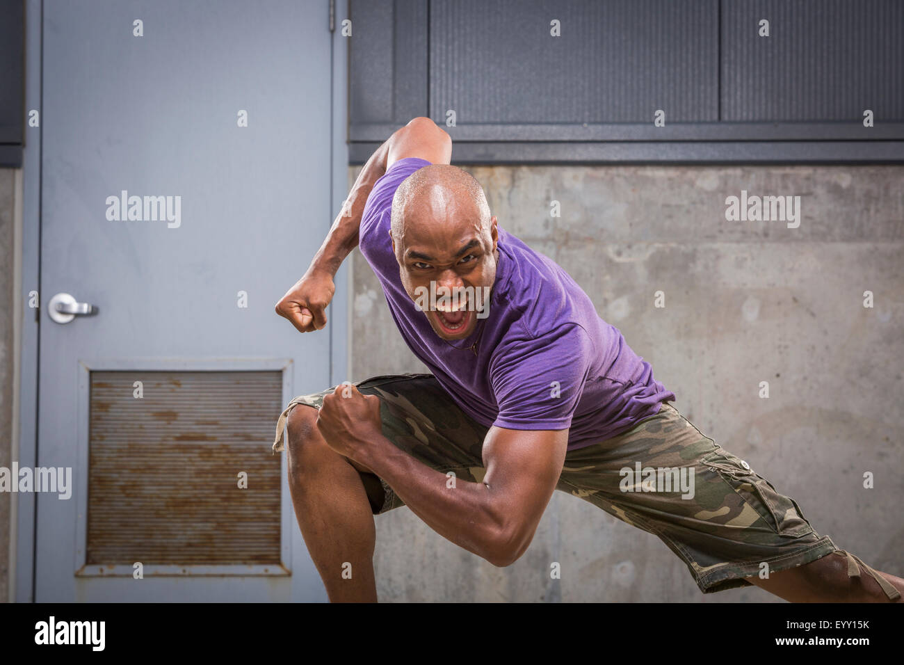 Crouching dance hi-res stock photography and images - Alamy