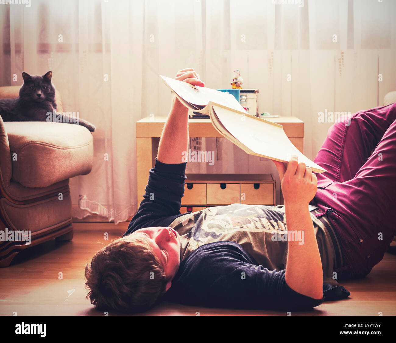 Man laying on floor hi-res stock photography and images - Alamy