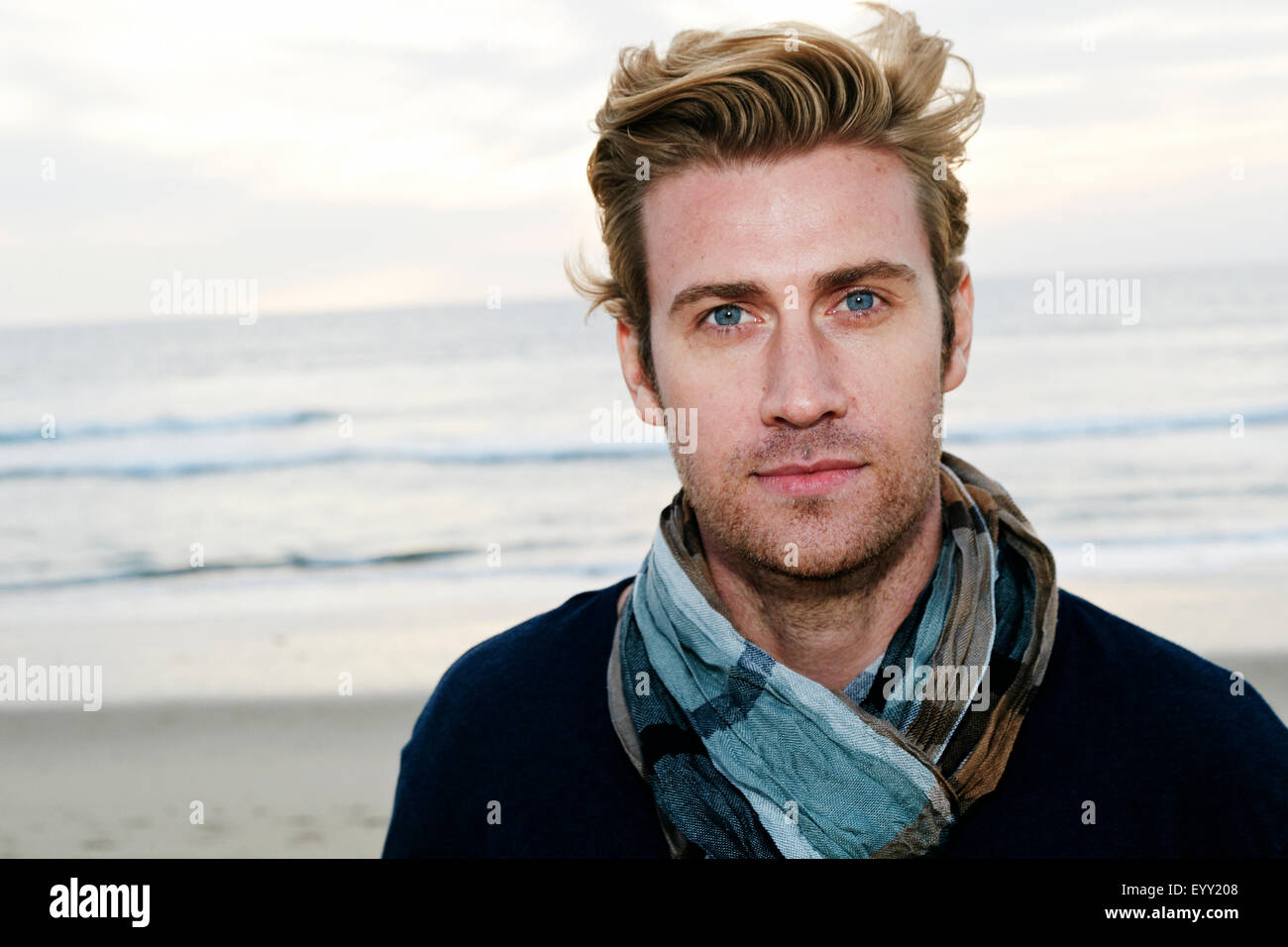 Man standing on beach hi-res stock photography and images - Alamy