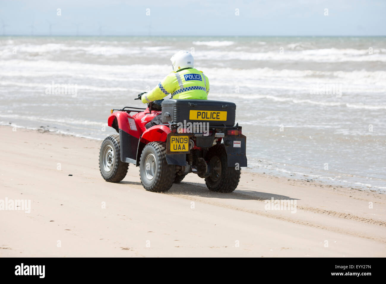 Formby beach near Southport , UK. Police on quad bikes Stock Photo - Alamy