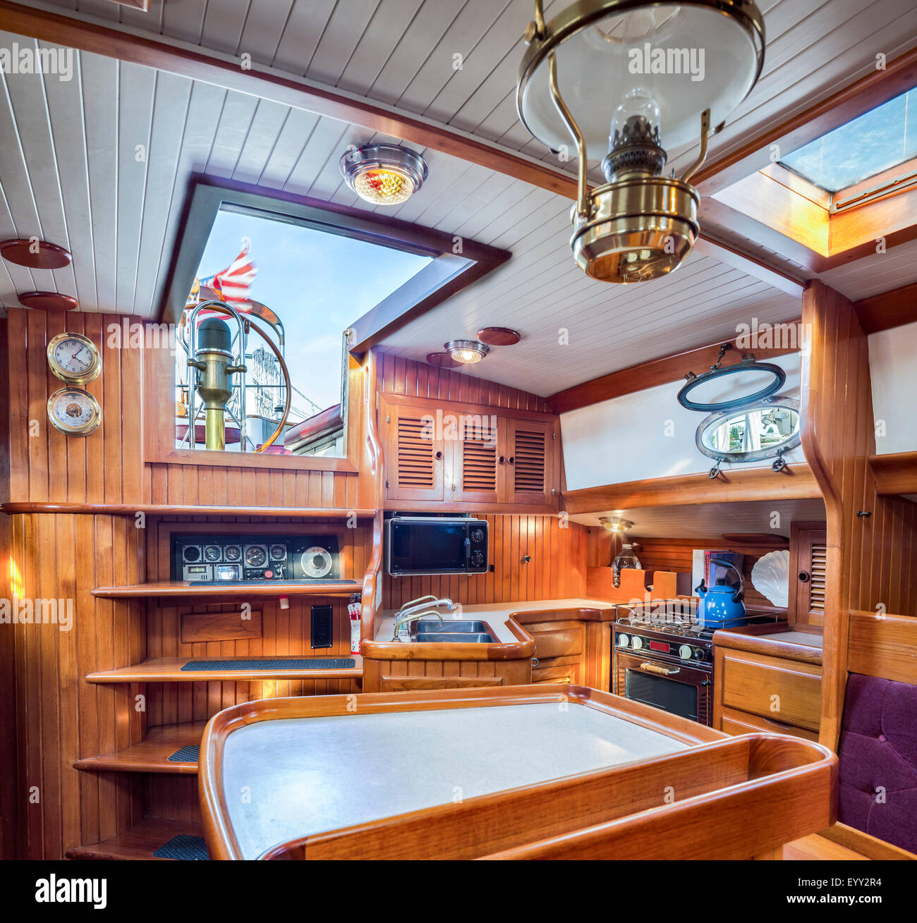 Below deck kitchen on houseboat Stock Photo - Alamy