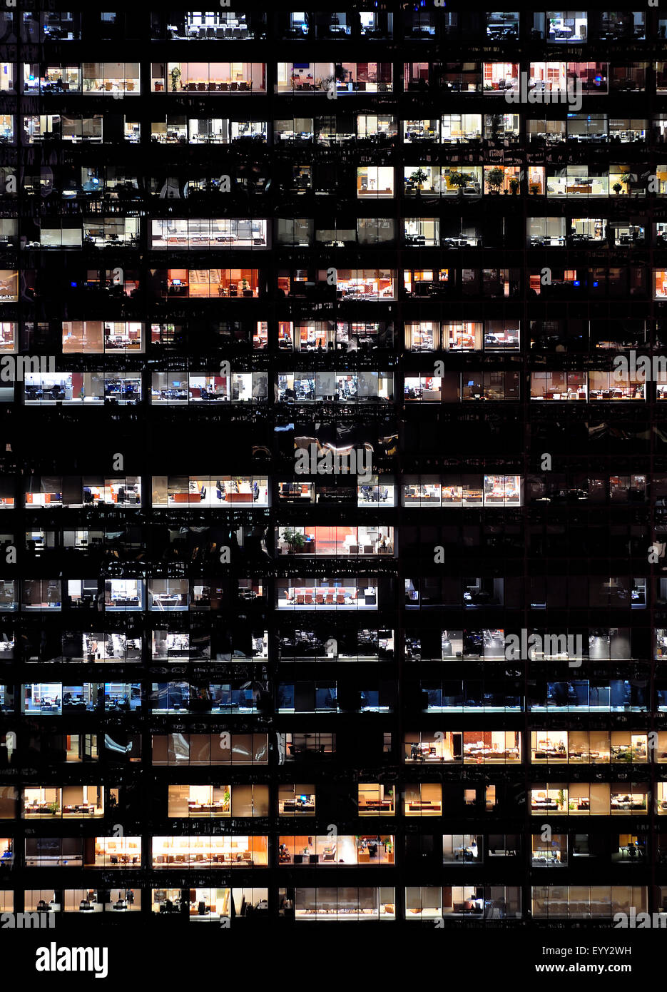Full frame of highrise building windows at night Stock Photo - Alamy