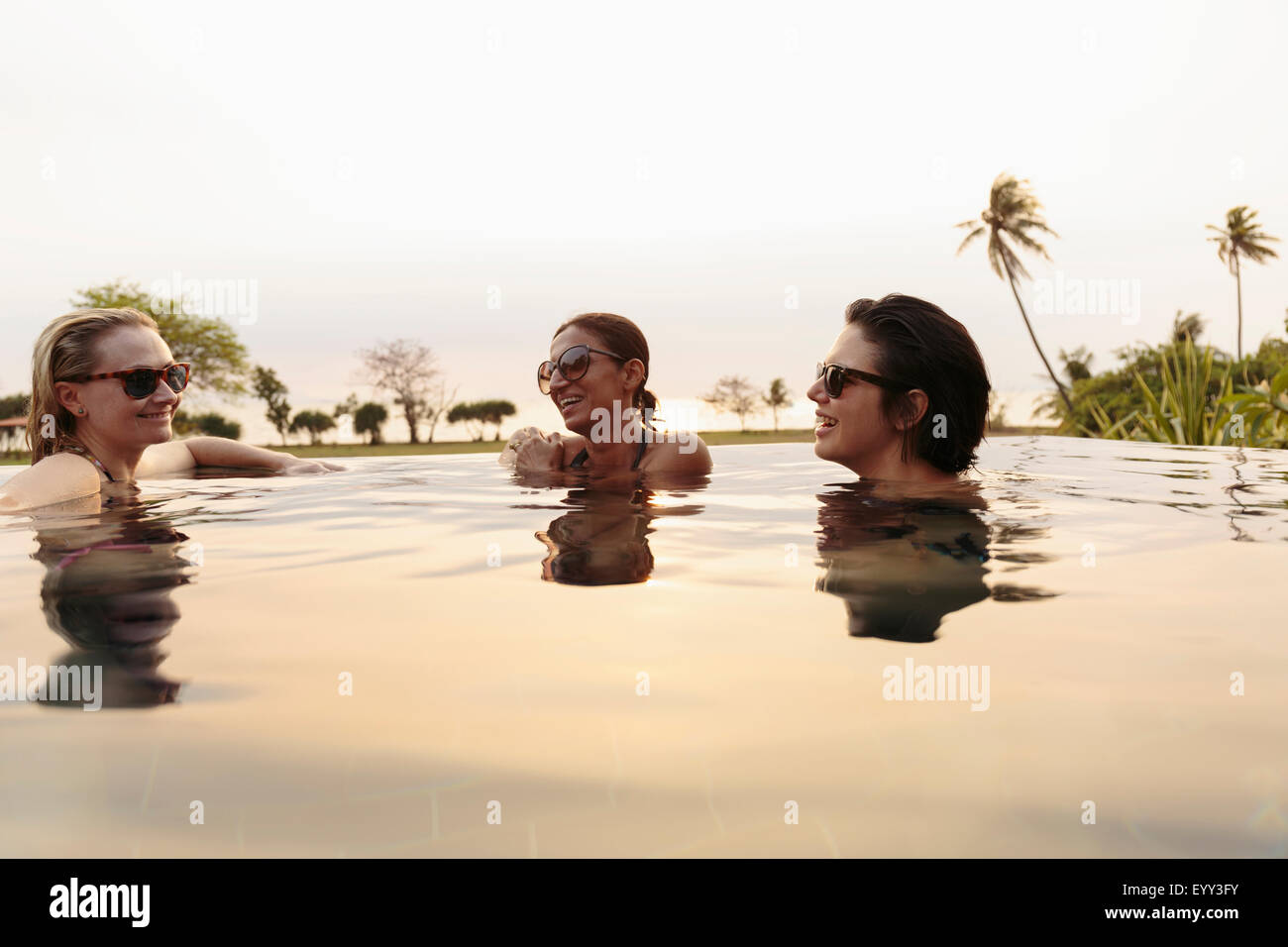 Woman in swimming pool smiling hi-res stock photography and images - Alamy