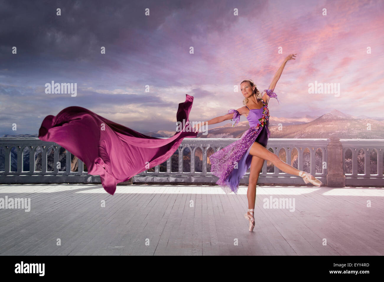 Caucasian woman ballet dancing on balcony Stock Photo - Alamy