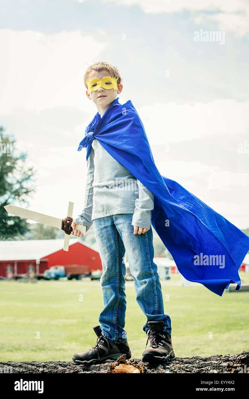 Caucasian boy wearing costume on farm Stock Photo - Alamy