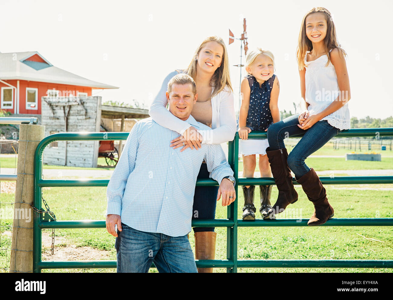 Caucasian family smiling on farm Stock Photo - Alamy