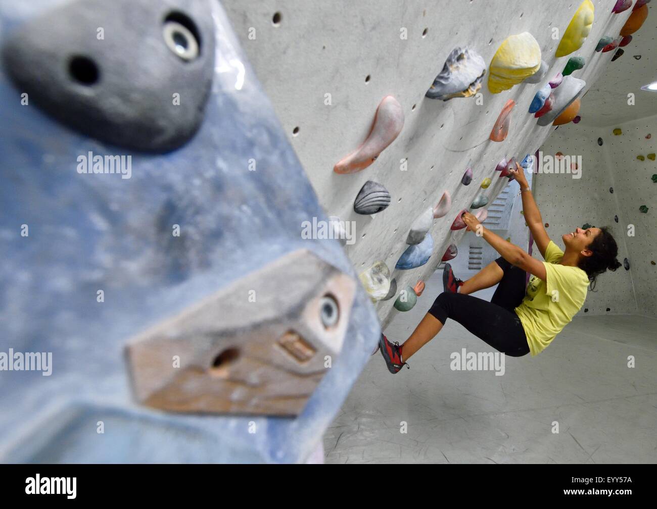 Student Leona Yinga makes her way up a climbing wall in 'Kletterthalia ...