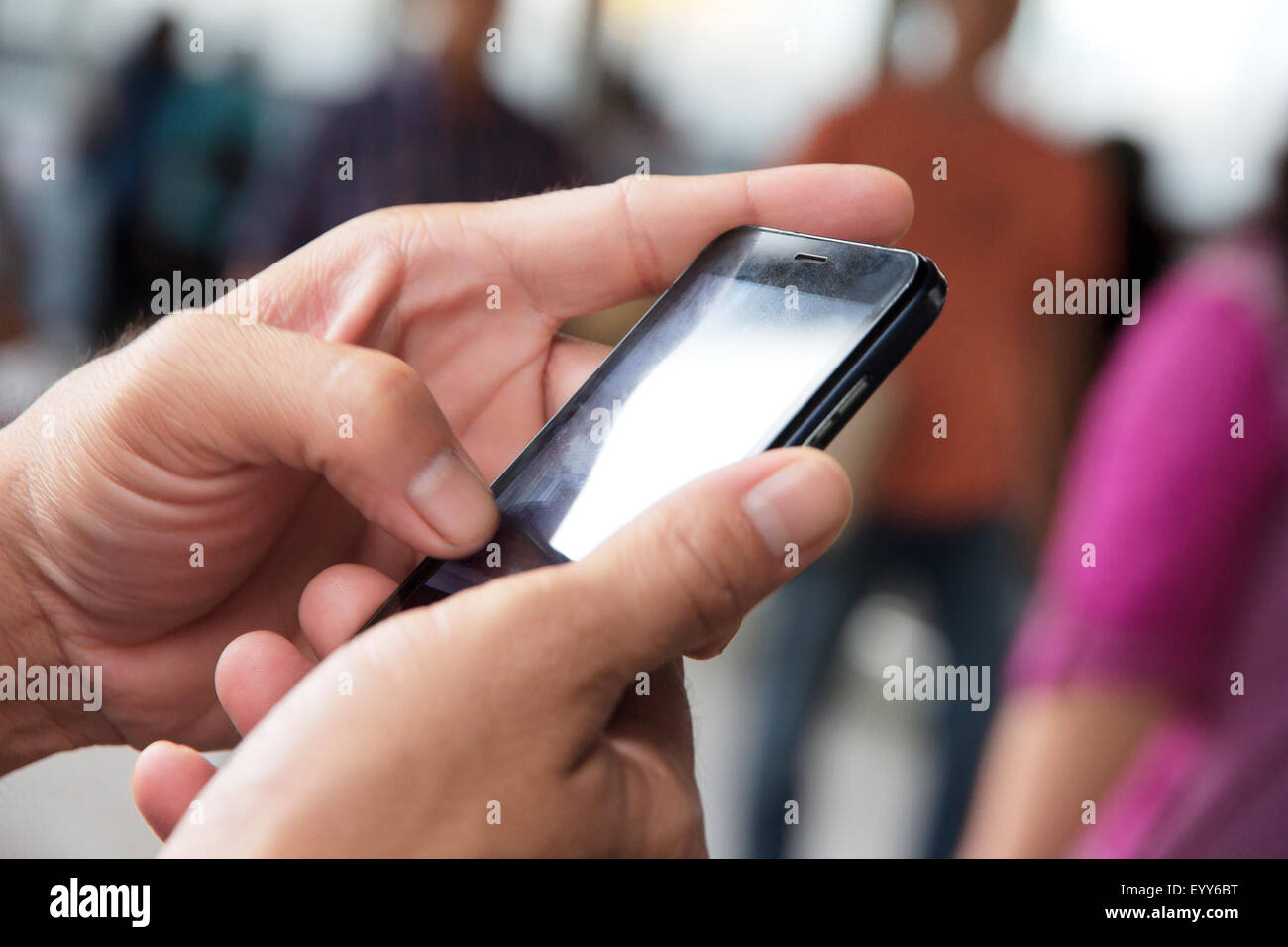 man checking his phone background Stock Photo - Alamy