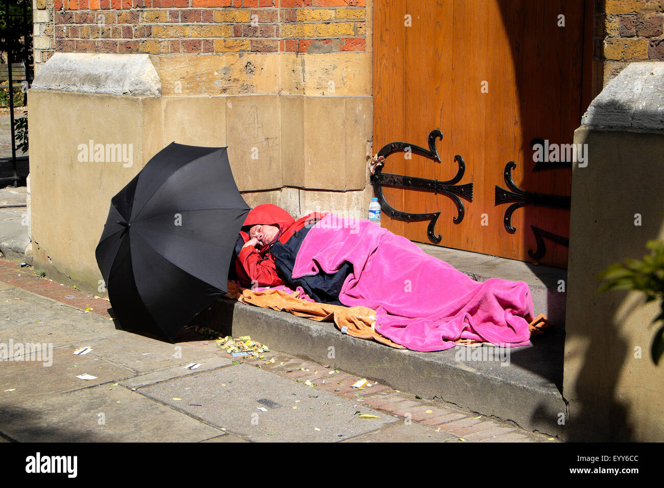 Homeless man with umbrella High Resolution Stock Photography and Images ...