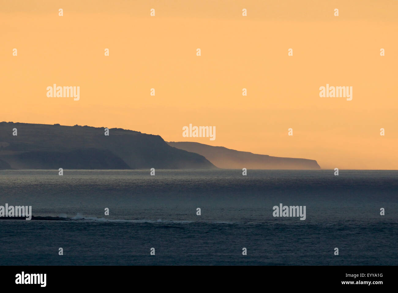 Sunset at Bempton RSPB Reserve looking towards Filey Brigg Stock Photo ...
