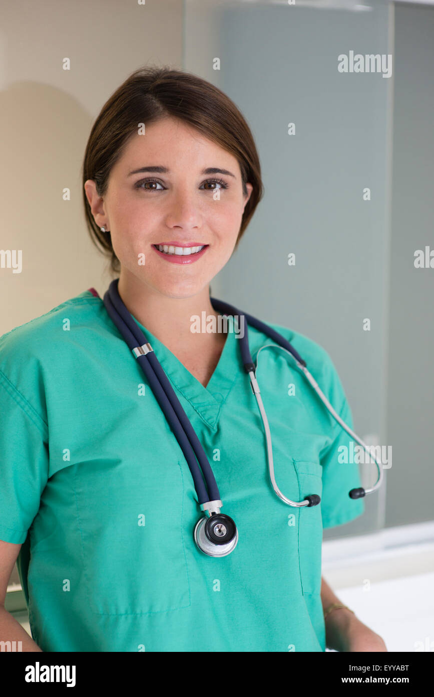Hispanic doctor wearing stethoscope in hospital Stock Photo - Alamy