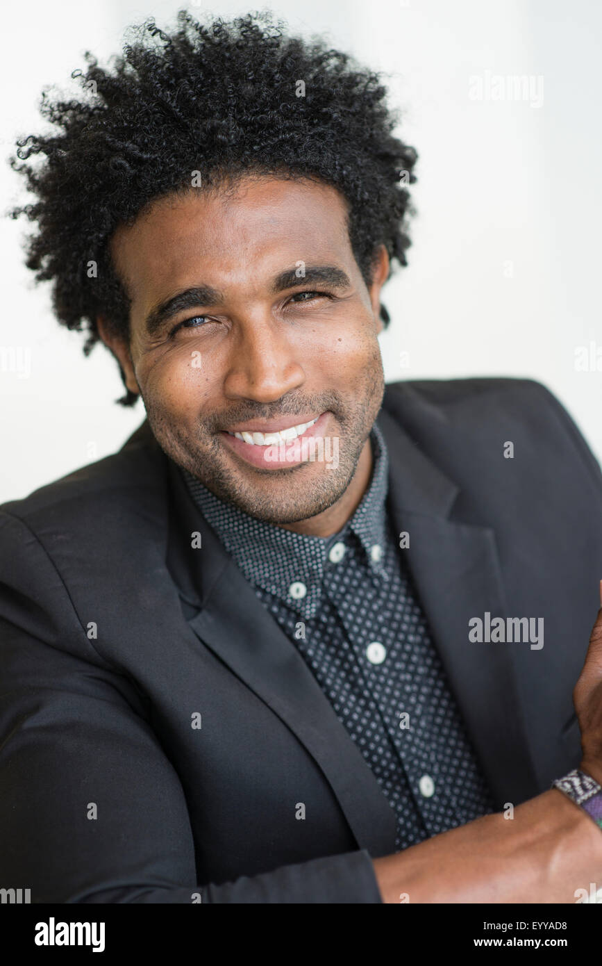 Hispanic men curly hair hi-res stock photography and images - Alamy