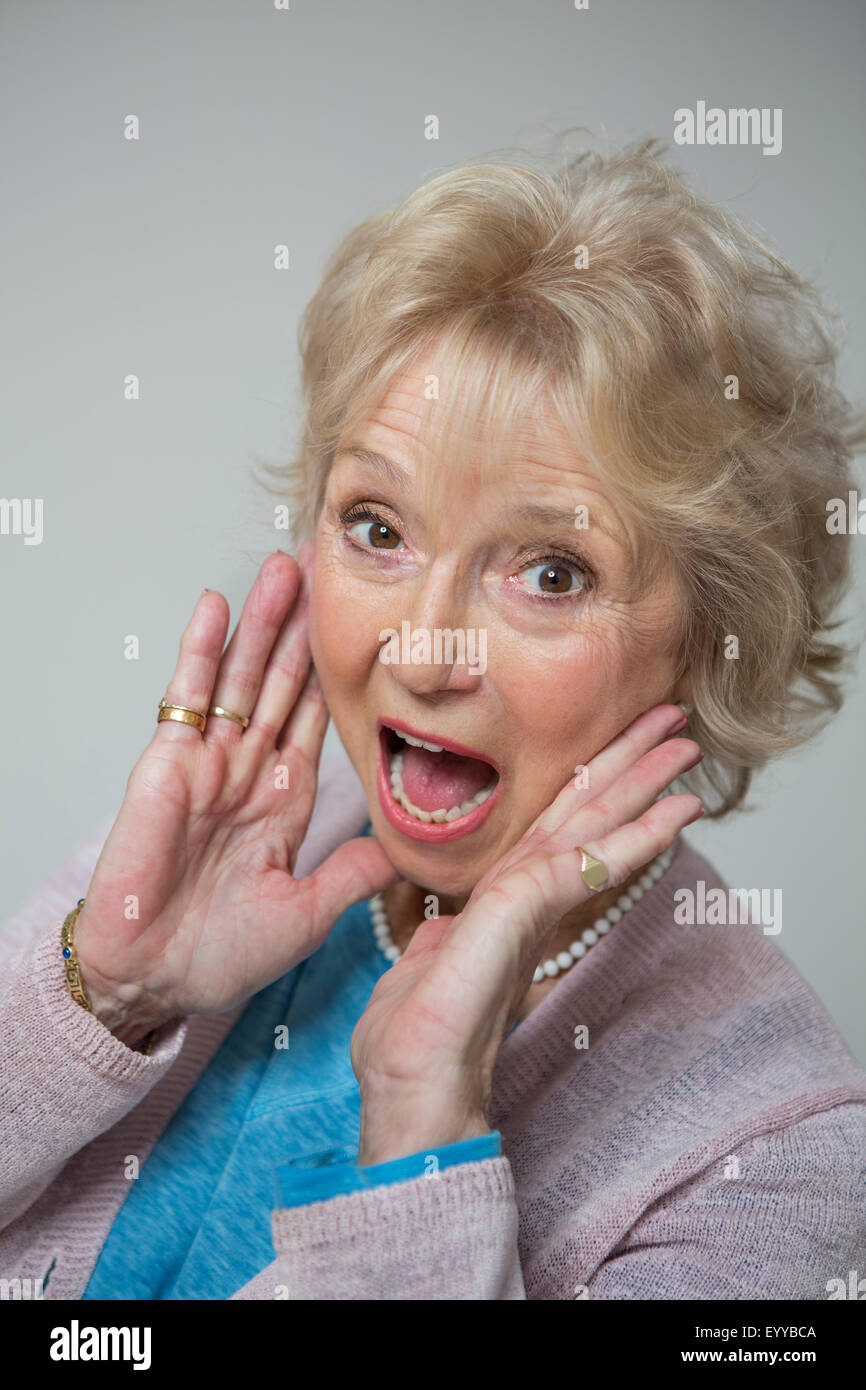 Close up of older Caucasian woman shouting Stock Photo - Alamy